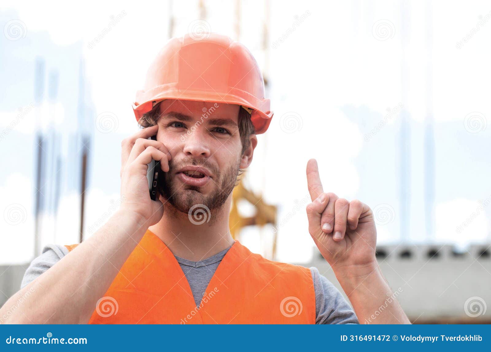 Portrait of Man Builder in Hardhat Working at Construction Site ...