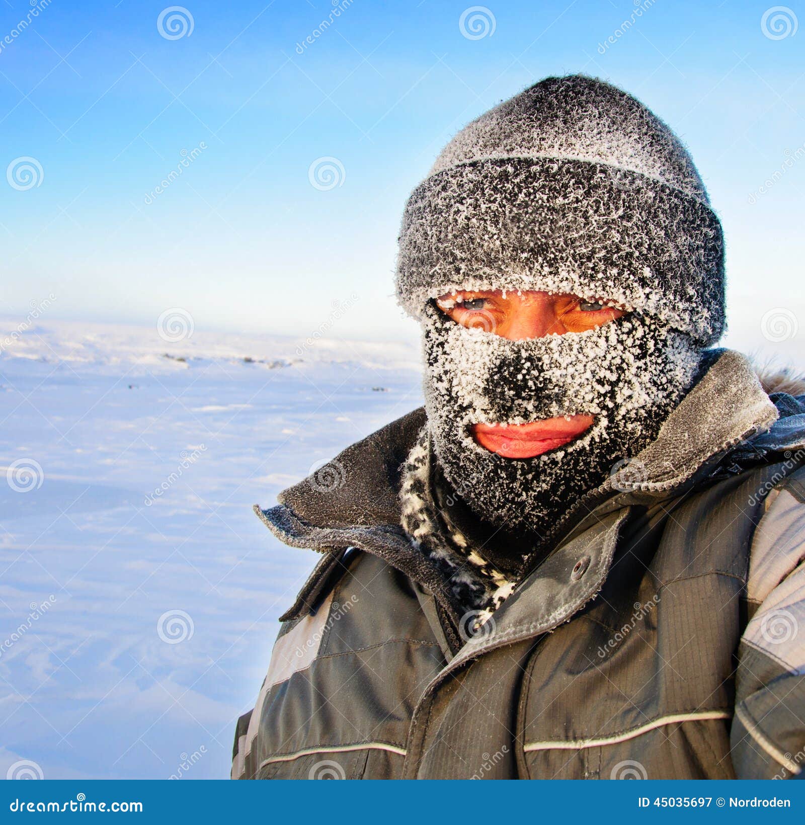 Portrait of a Man in a Cap and a Ski Mask. Stock Image - Image of ...