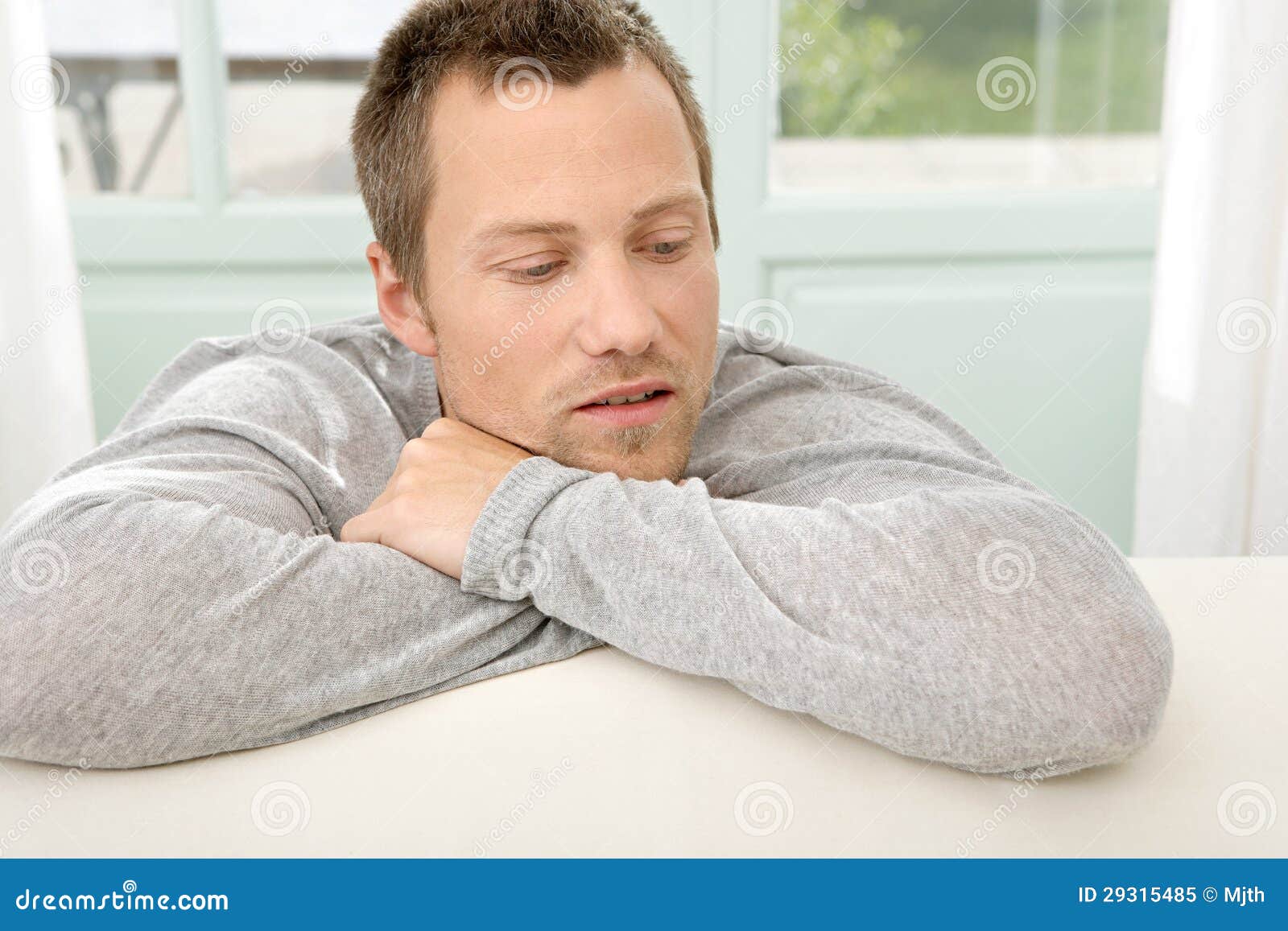 Portrait of man by couch. stock image. Image of green - 29315485