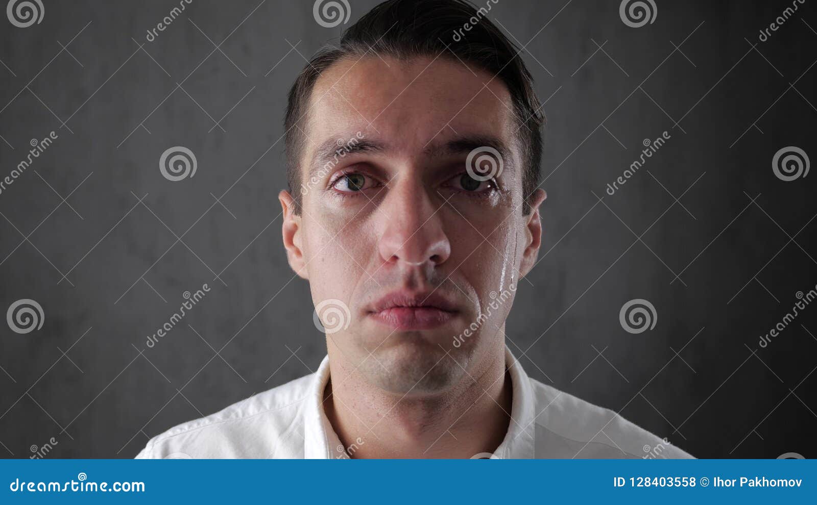 Portrait of Sad Man Looking at Camera with Tears in His Face. Man in ...