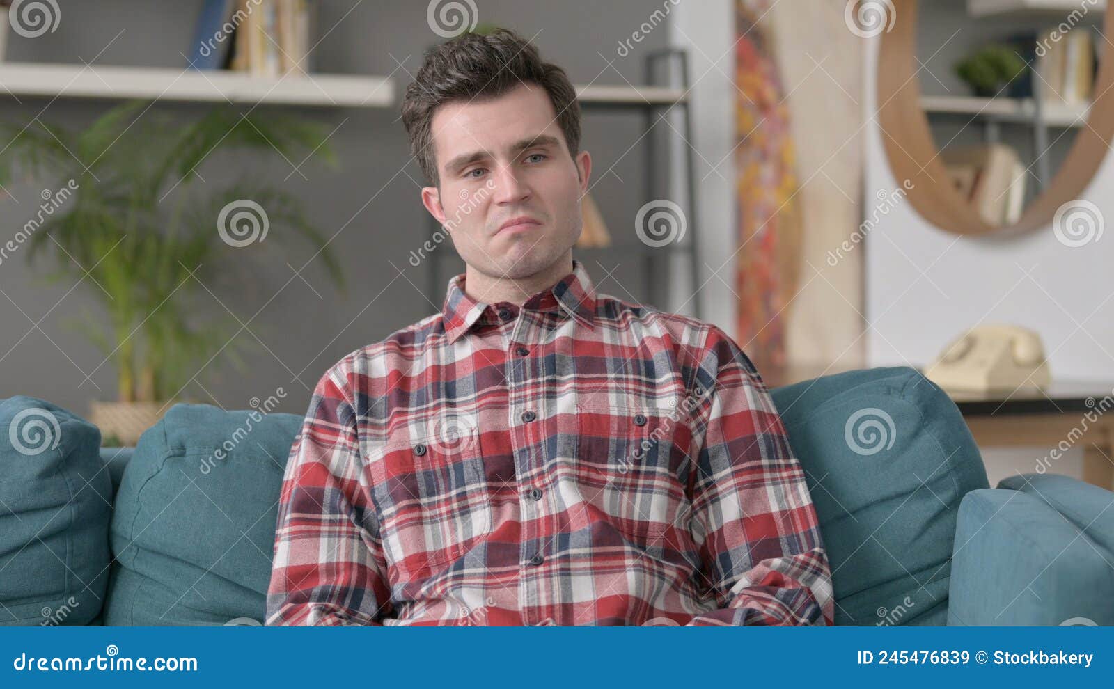 Portrait of Man Crying Towards the Camera, Sofa Stock Image - Image of ...