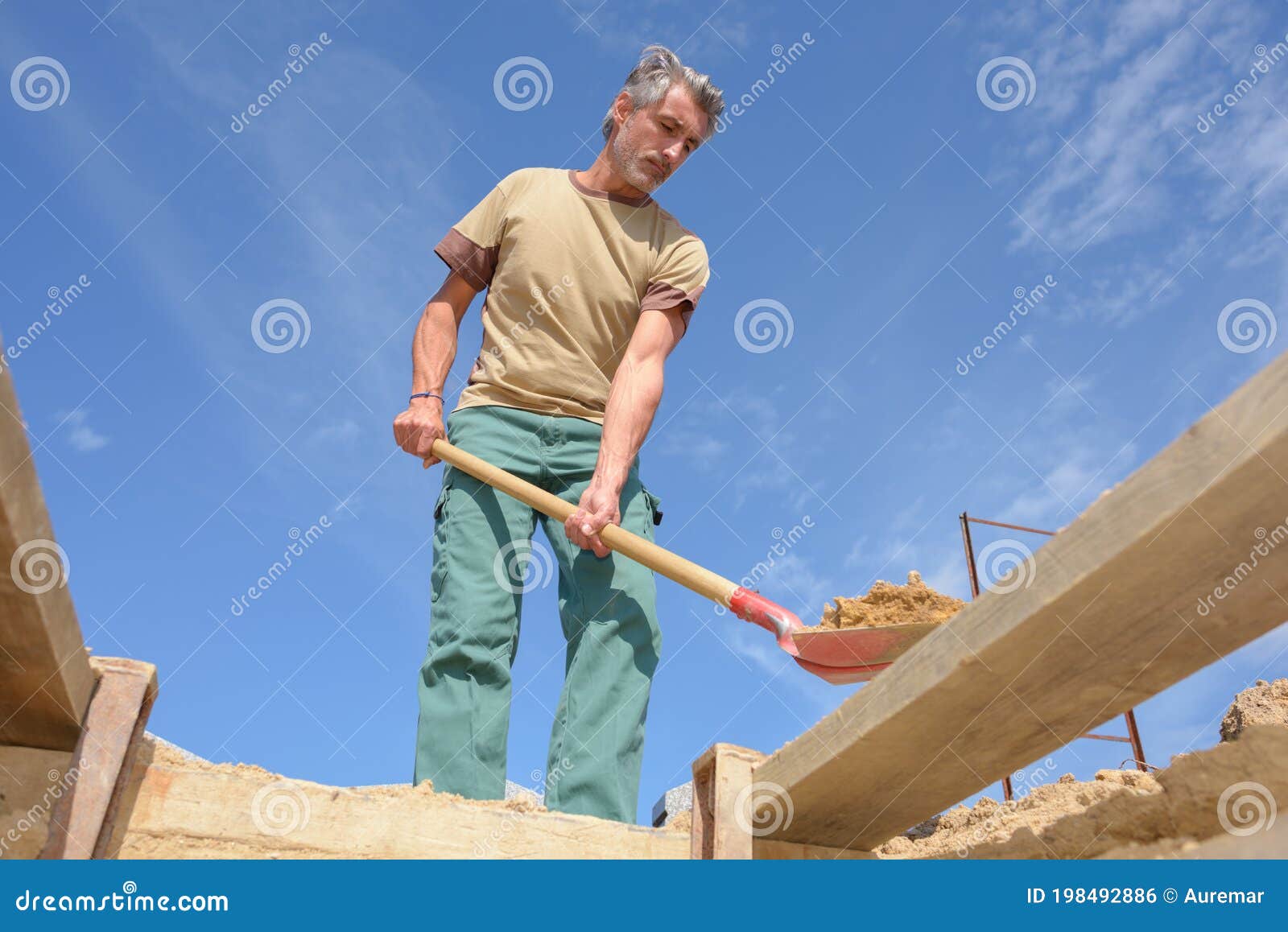 Portrait man digging hole stock photo. Image of service - 198492886
