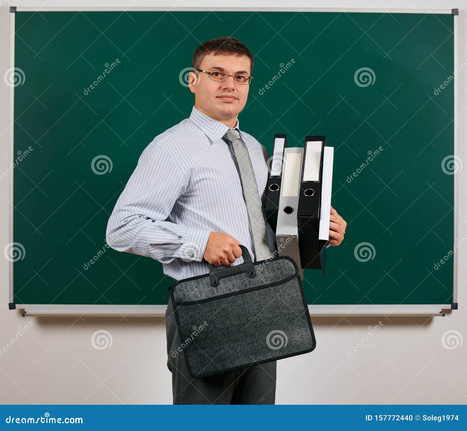 Portrait of a Men Dressed in Business Suit with Folders, Documents and ...