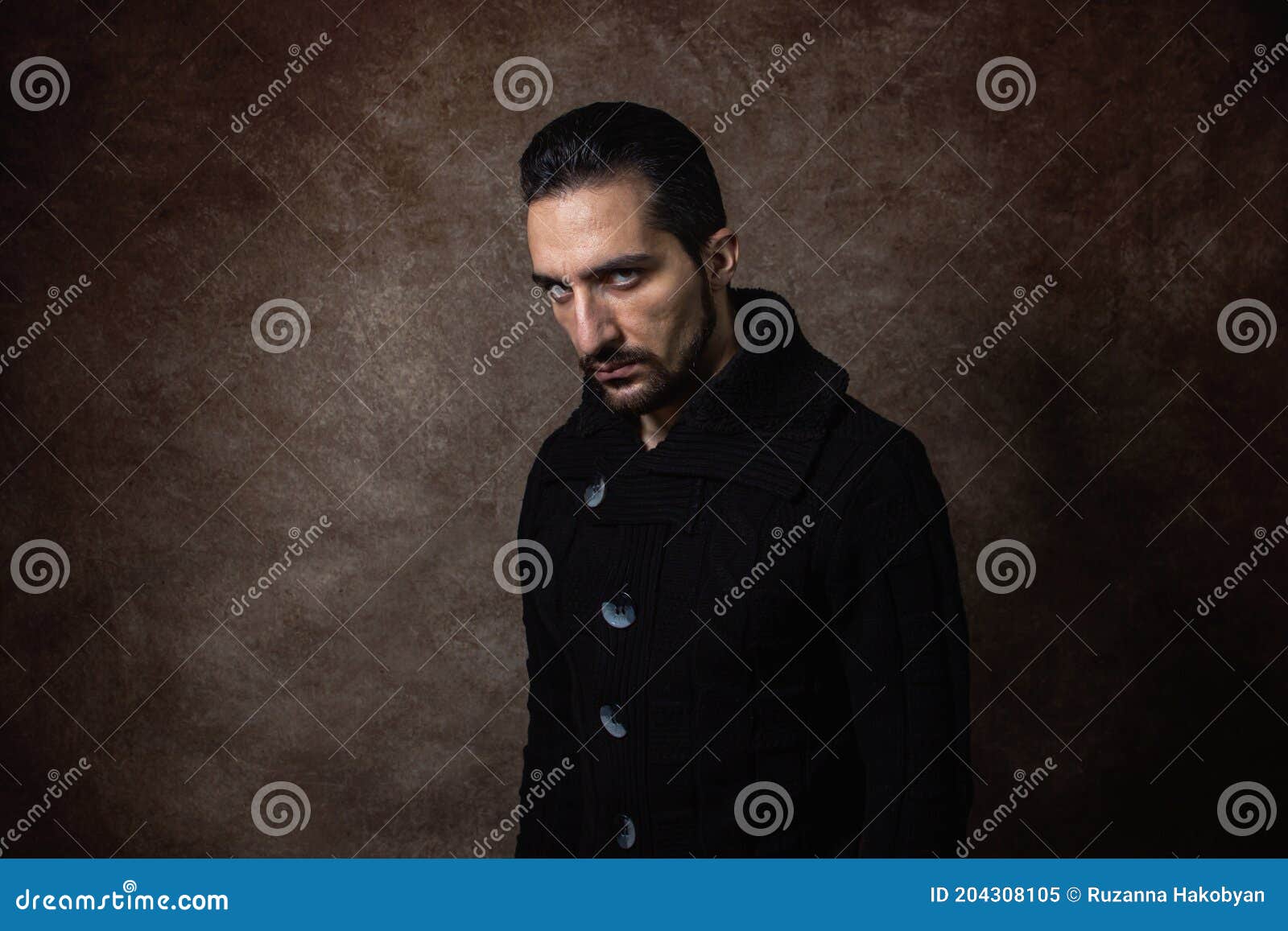 Portrait of a Man. Evil Look. Guy in a Black Sweater Stock Image ...