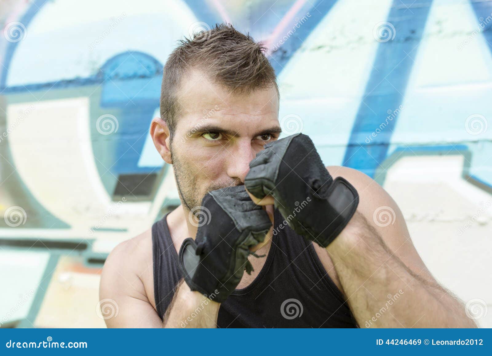 Portrait of Man Fighter in Boxing Pose, Urban Style. Stock Image ...