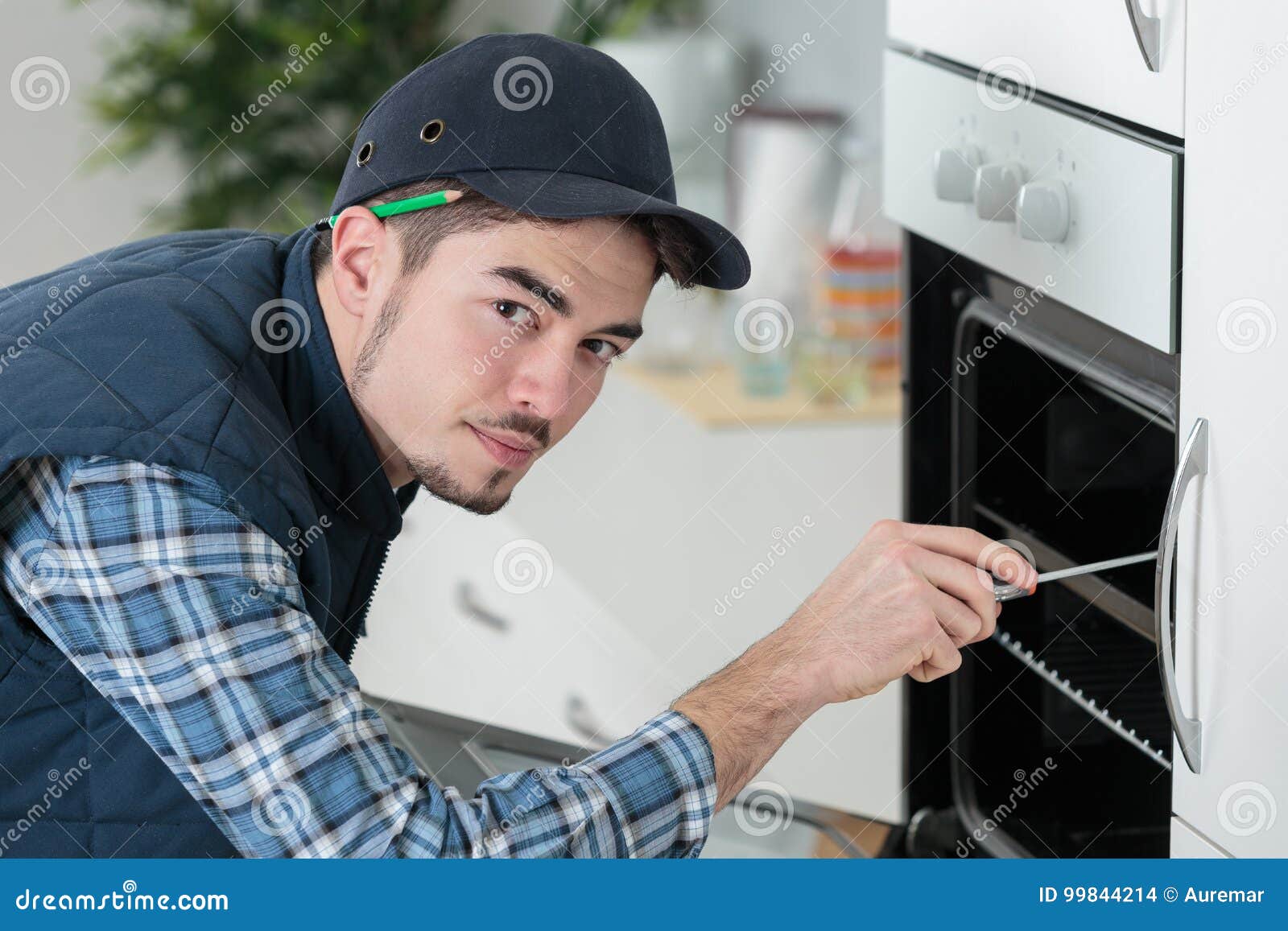 Portrait Man Fitting New Oven Stock Photo - Image of installation ...