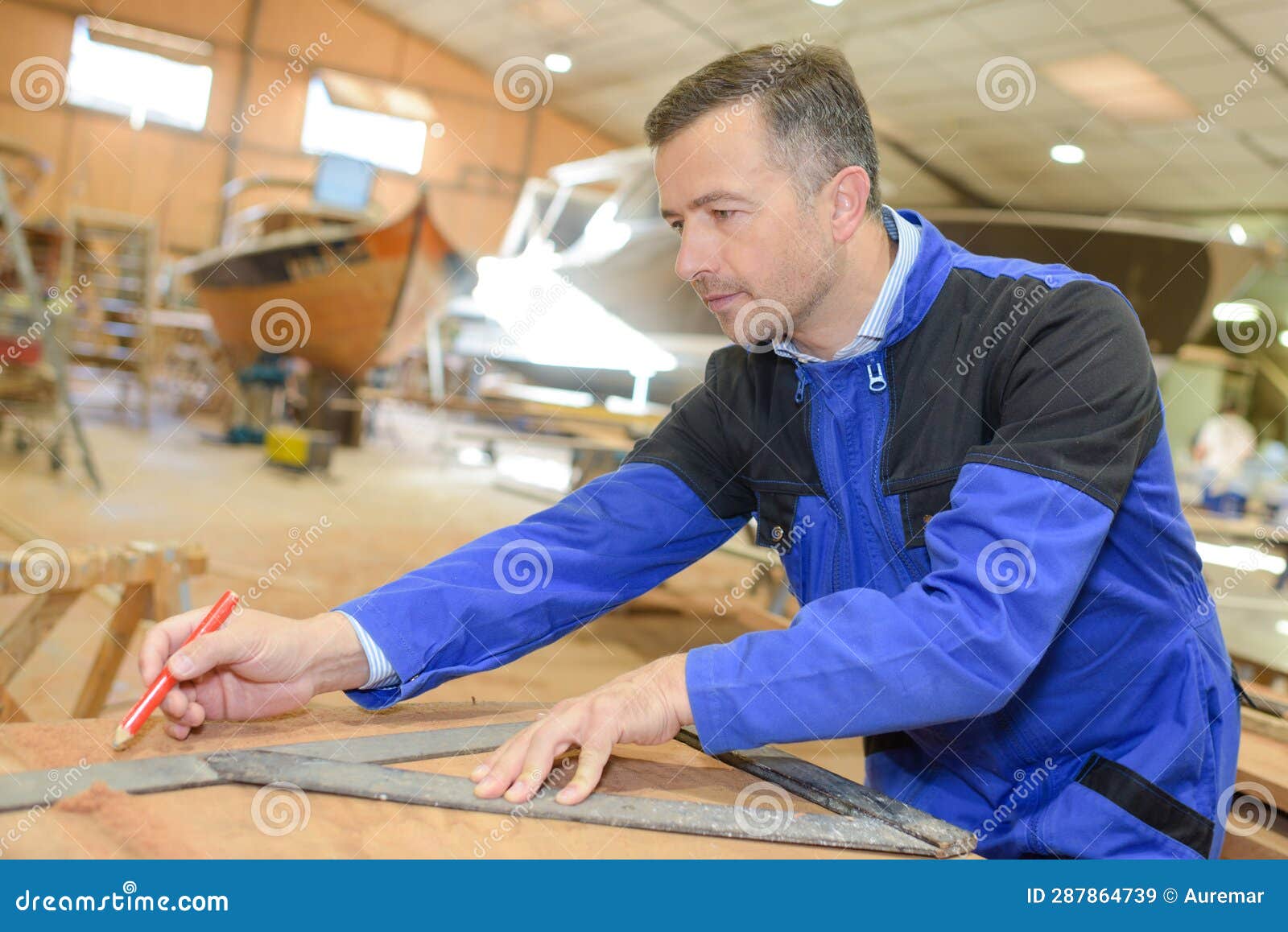 Portrait man fixing boat stock image. Image of build - 287864739