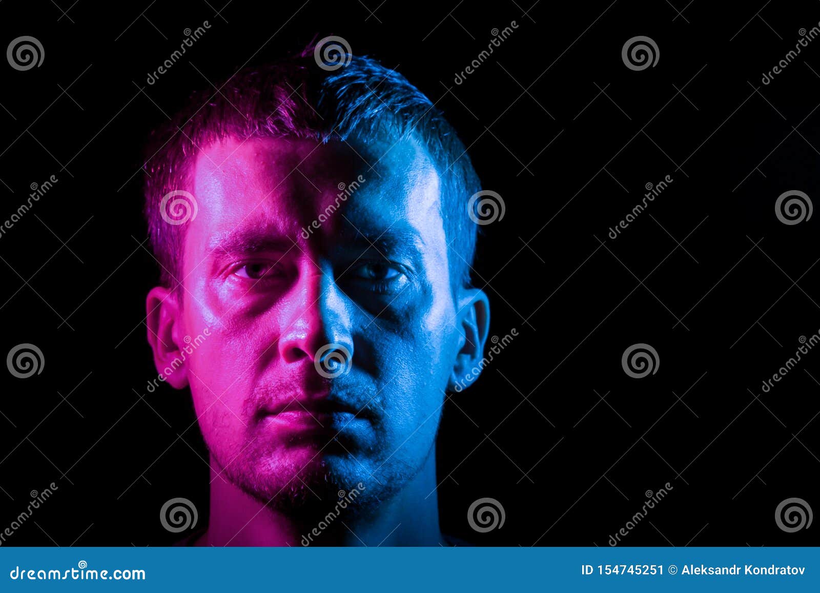 Portrait of Man in Full Face Illuminated with Pink and Blue Stock Image ...