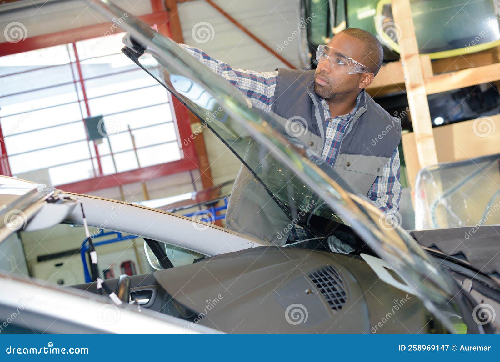 Portrait Man Holding Windscreen Stock Image - Image of bulky, forward ...