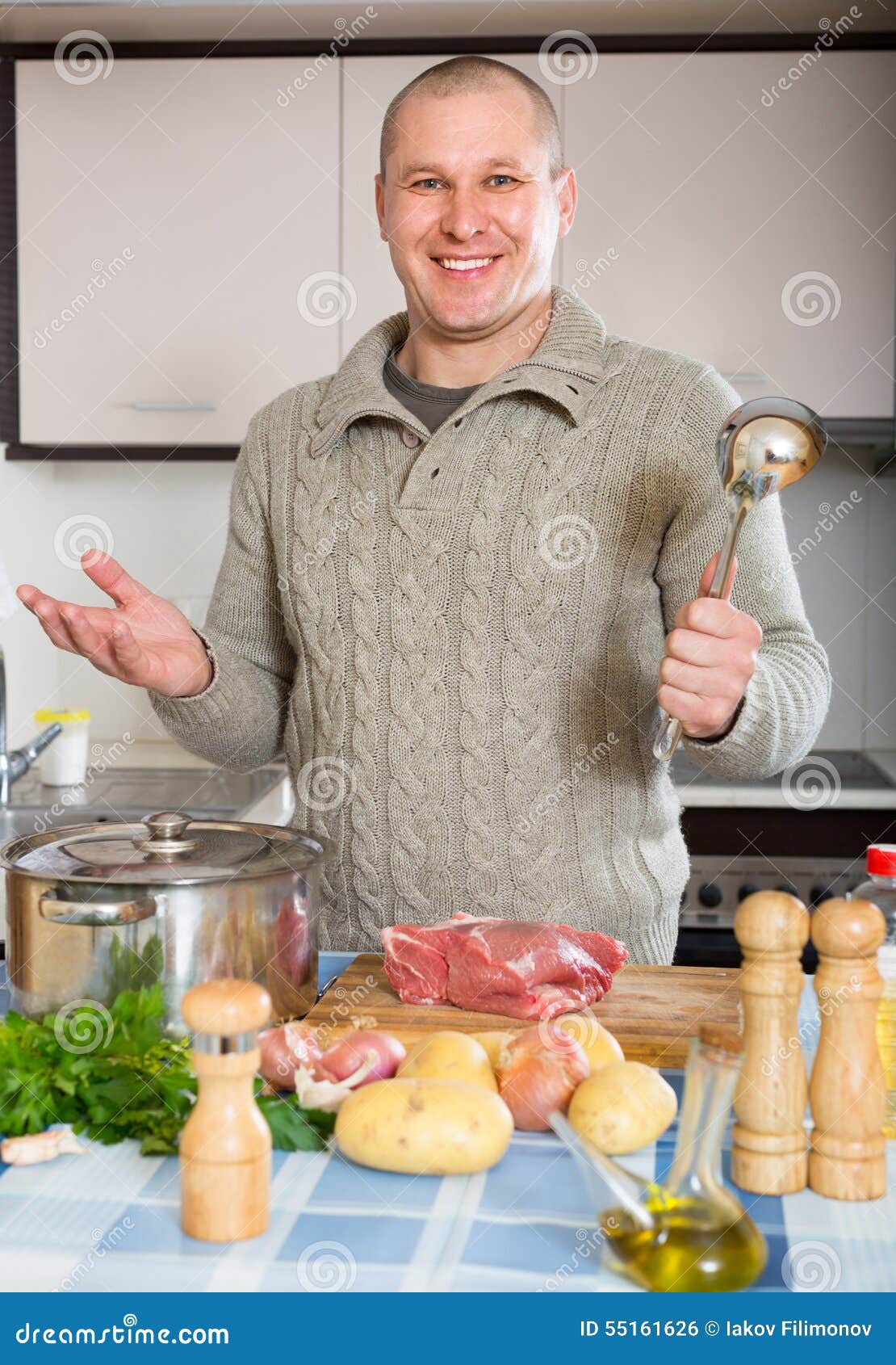 Portrait of man at kitchen stock photo. Image of happy - 55161626