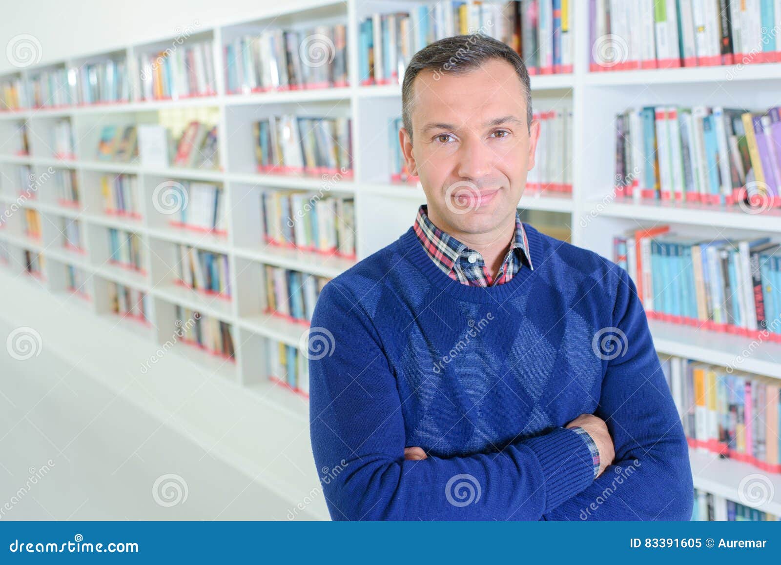 Portrait man in library stock image. Image of textbooks - 83391605
