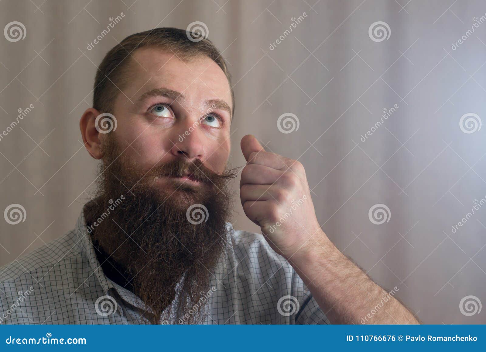 A Portrait of a Man with a Long Beard that Twists His Mustache Stock ...