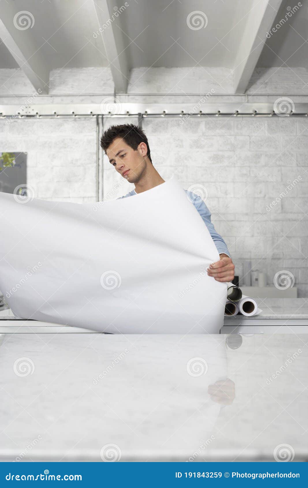 Portrait of Man Looking at Building Plan Stock Image - Image of studio ...