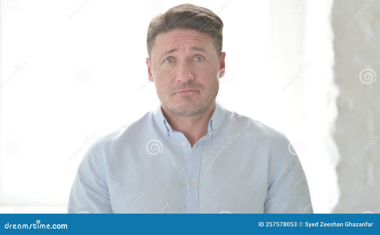 Portrait of Man Looking at the Camera, Sad Expression Stock Image ...