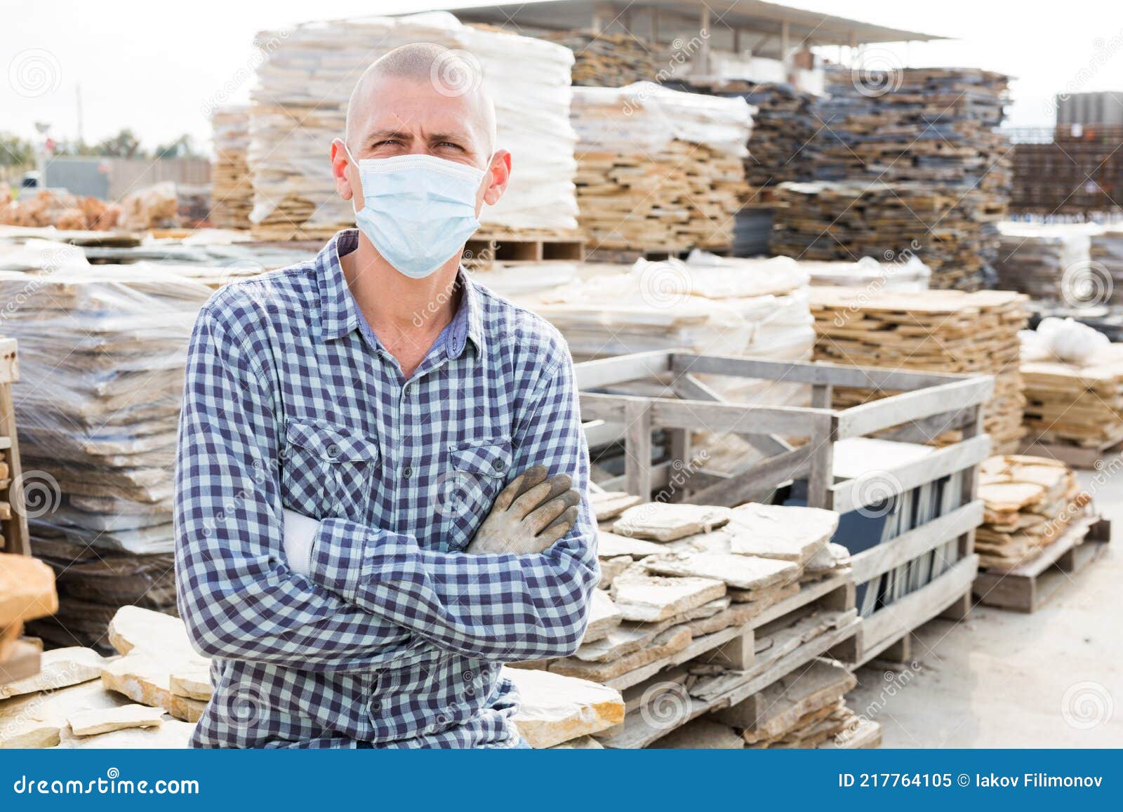 Portrait of Man in Mask Standing in Warehouse of Hardware Store Stock ...