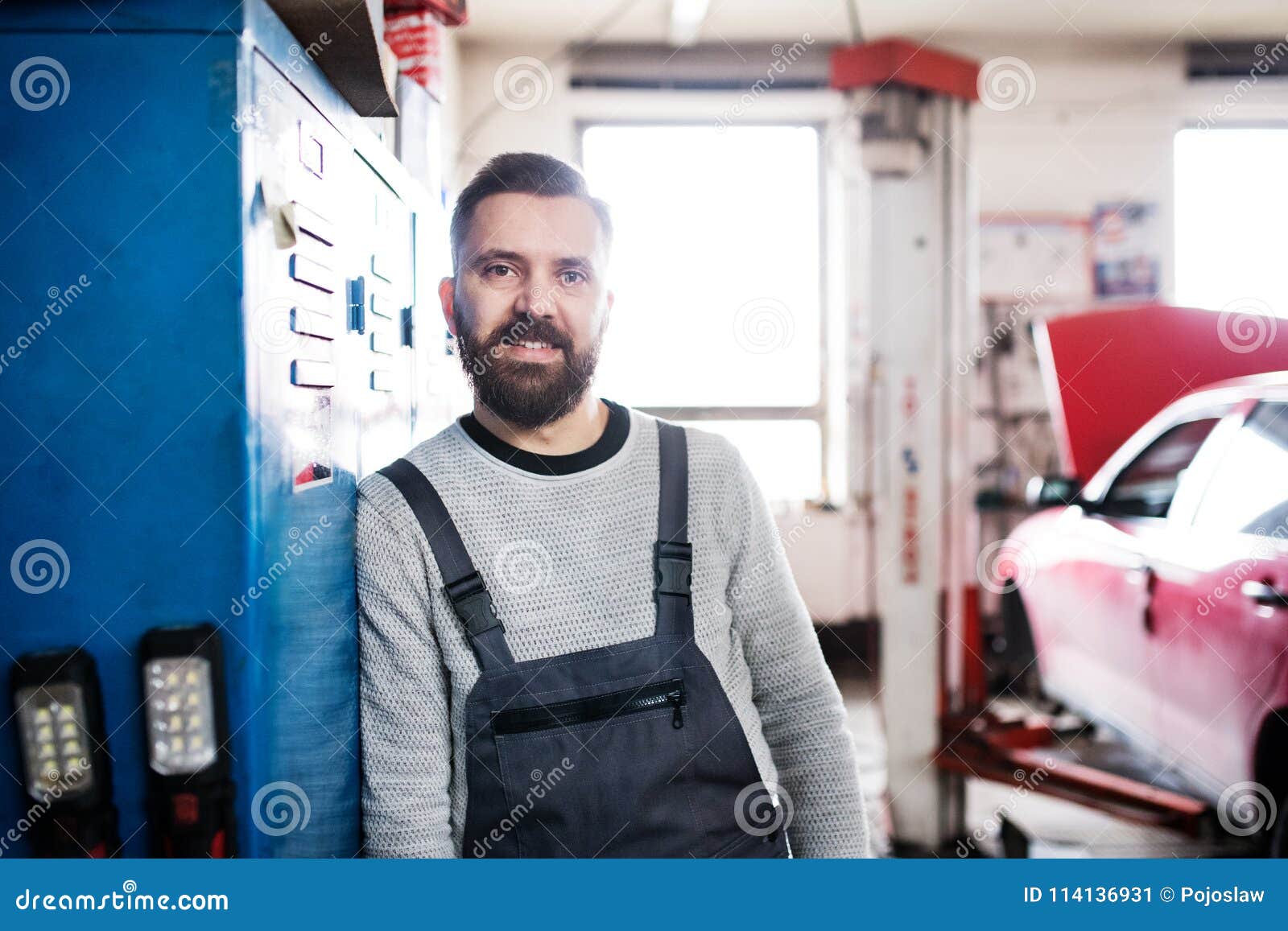 Portrait of a Man Mechanic in a Garage. Stock Image - Image of mustache ...