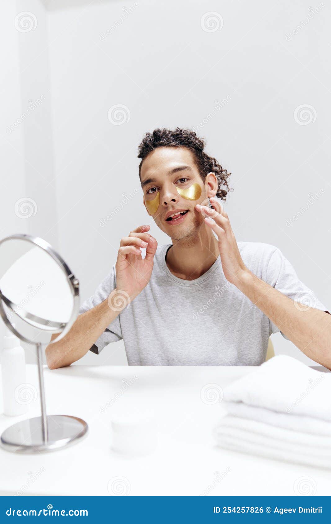 Portrait of a Man with Patches on the Face Sit in Front of the Mirror ...