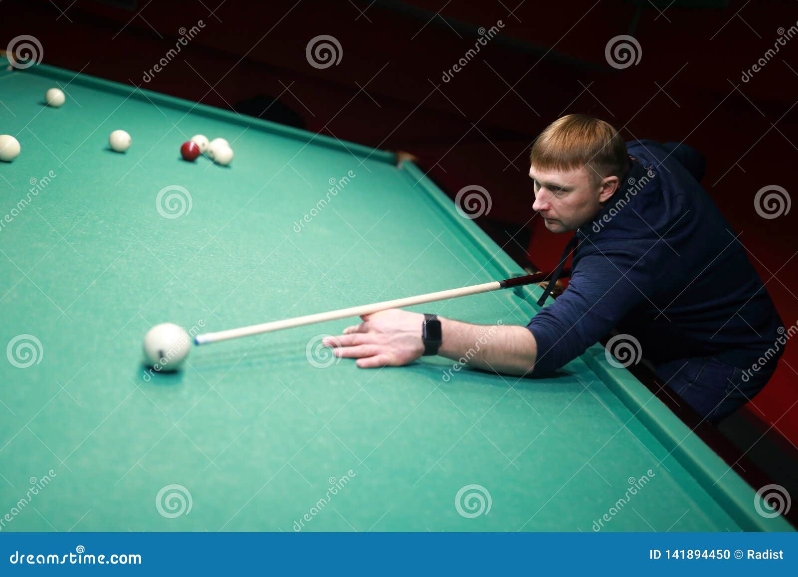 Man playing billiards stock photo. Image of hobby, ball - 141894450