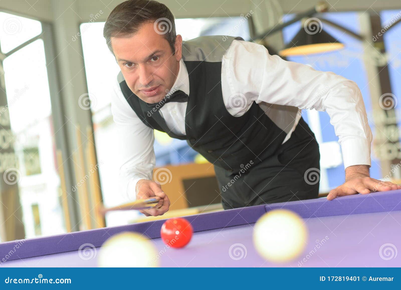 Portrait man playing pool stock image. Image of shoot - 172819401