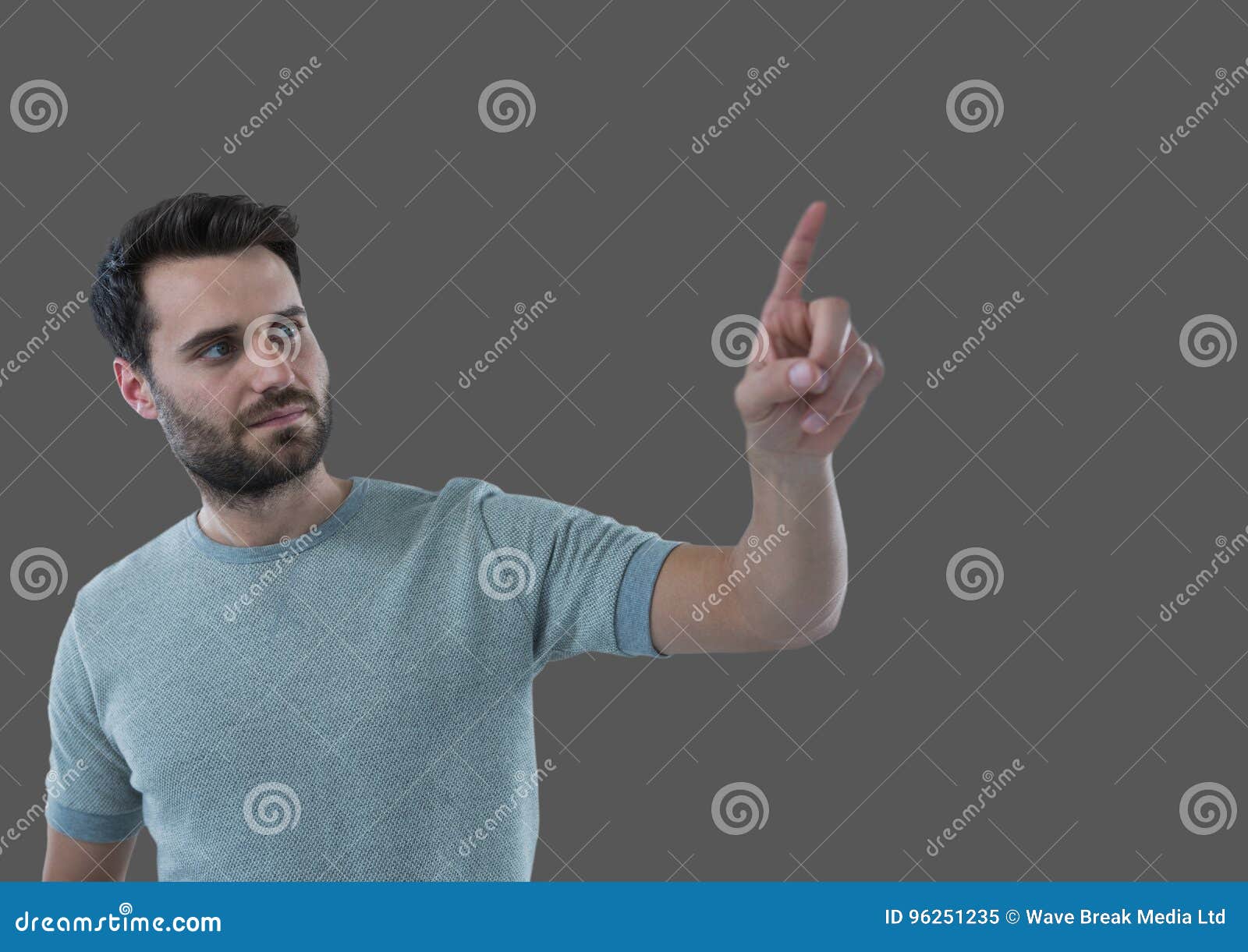 Portrait Of Man Pointing With Grey Background Stock Image - Image of ...