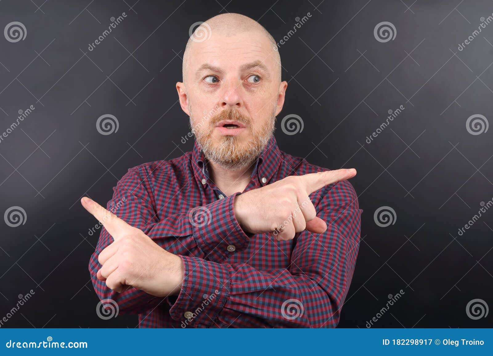 Portrait of a Man Pointing His Index Fingers in Different Directions ...