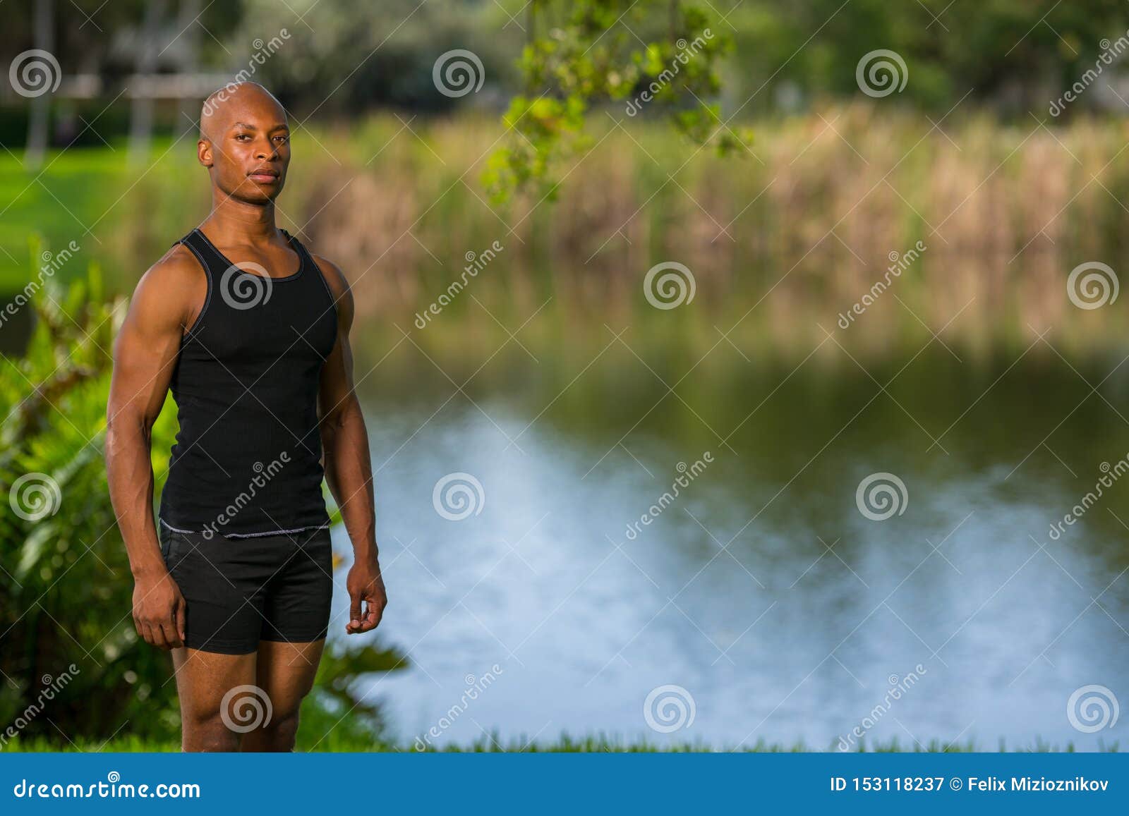 Portrait of a Man Posing by the Lake Stock Image - Image of 3035 ...