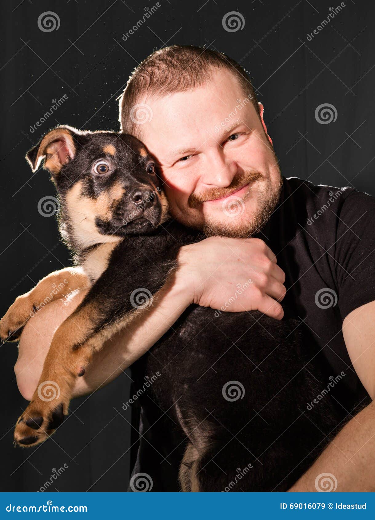 Portrait of a Man with Puppy Dog Stock Image - Image of friendly, young ...