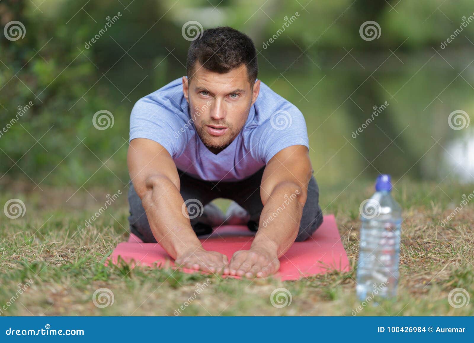 Portrait Man Reaching Forward on Exercise Mat Stock Photo - Image of ...