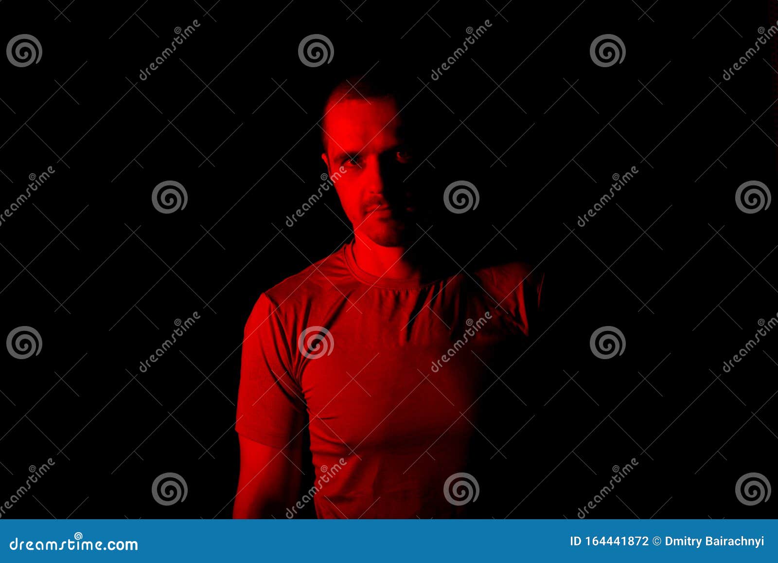 Portrait of Man with Red Light Looking in Camera Stock Photo - Image of ...