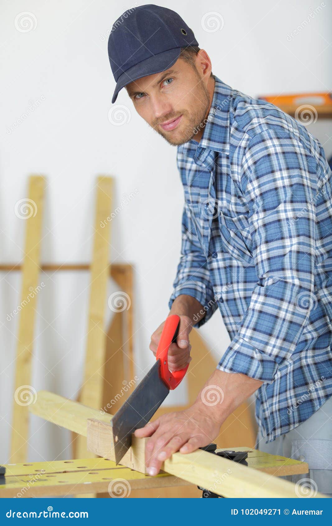 Portrait man sawing wood stock image. Image of industrial - 102049271