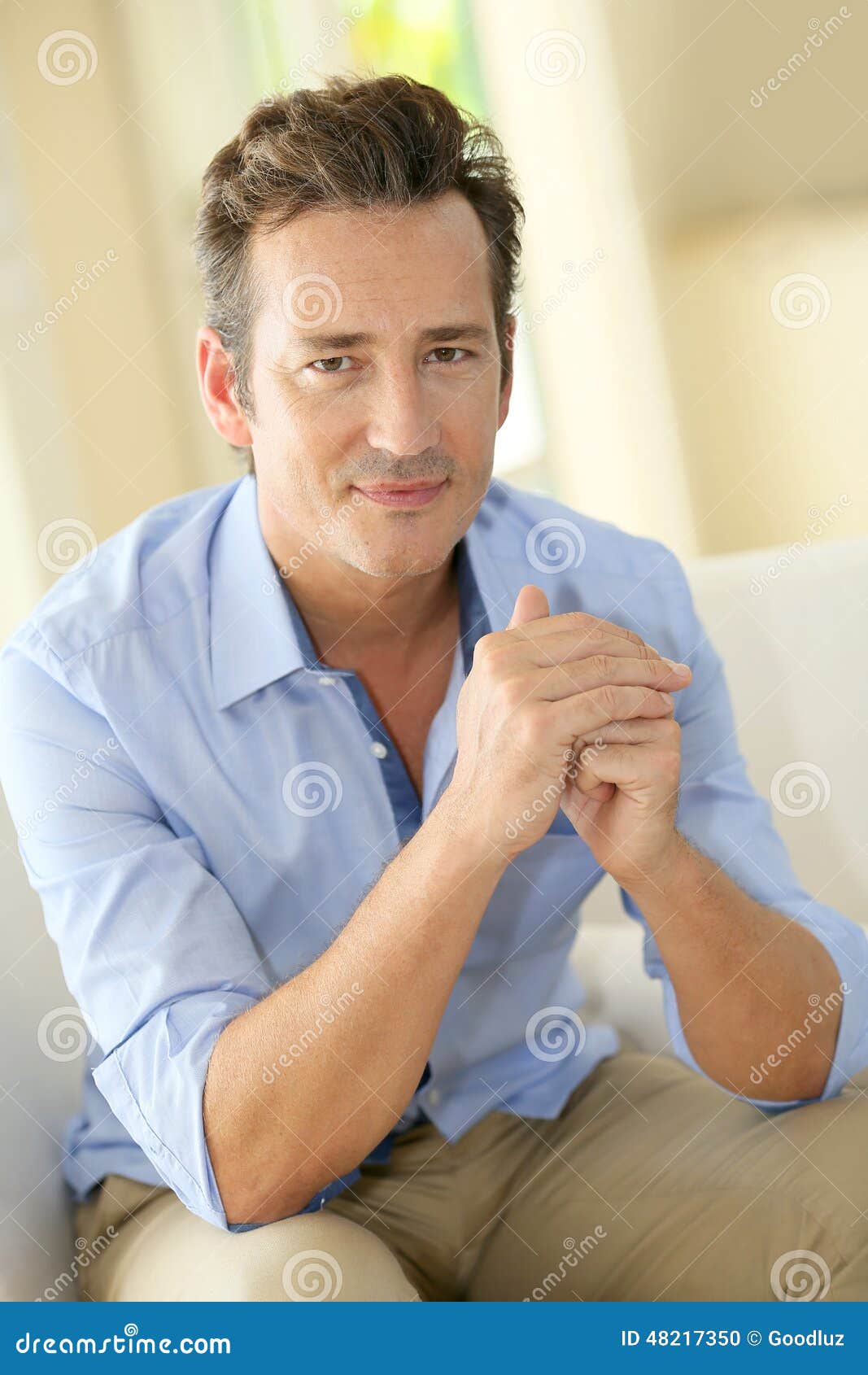 Portrait of a Man Sitting at Home Stock Photo - Image of relaxing ...
