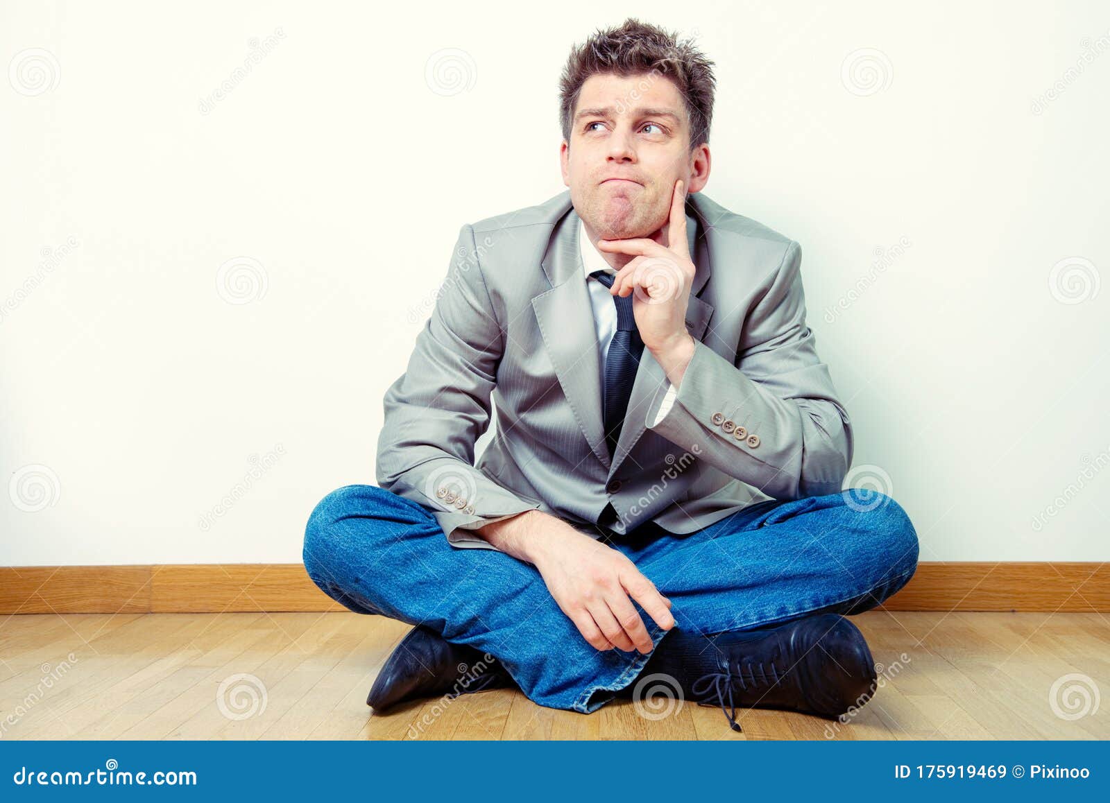 Portrait of a Man Sitting in Interrogative Expression. Business Concept ...