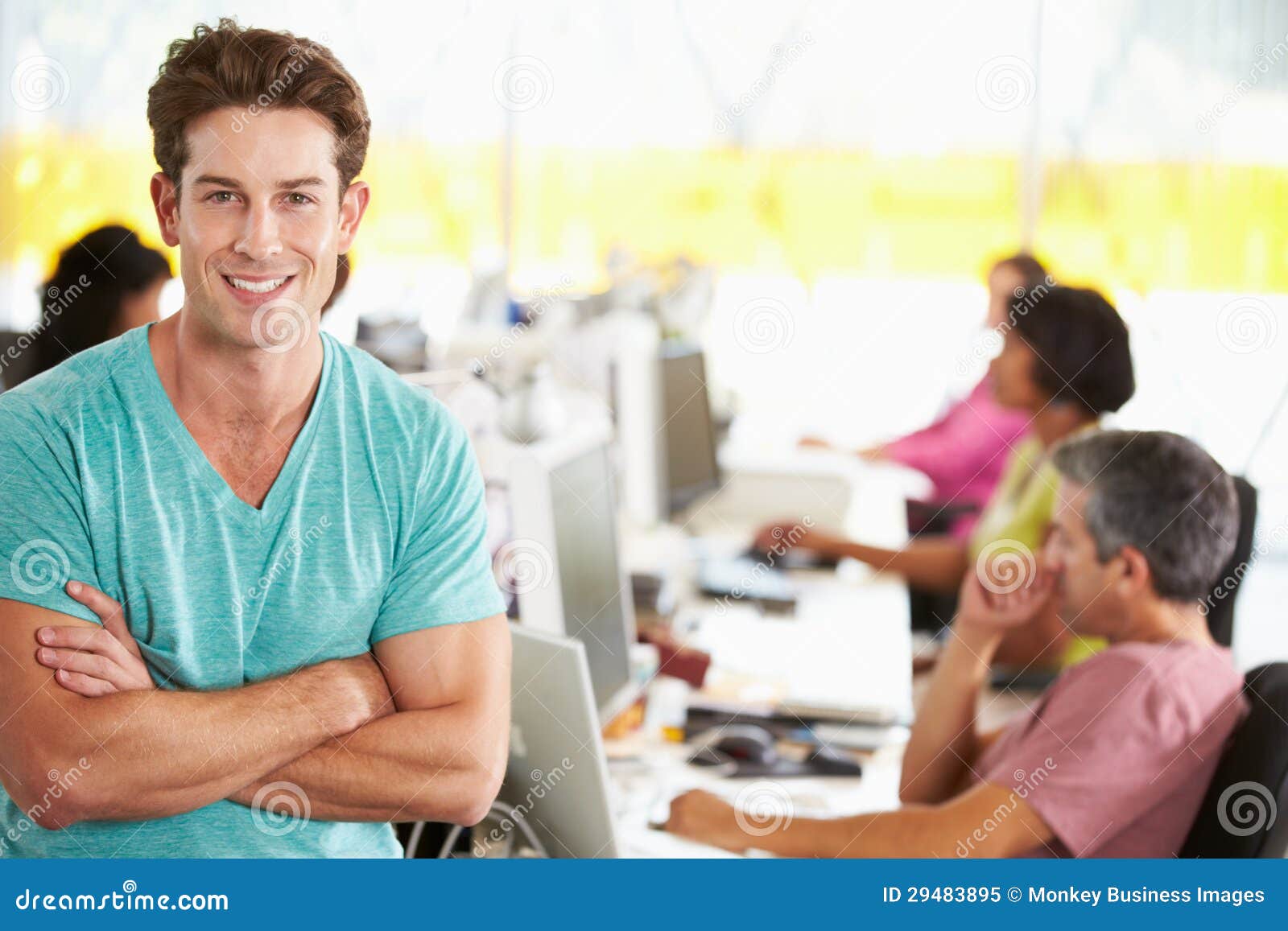 Portrait of Man Standing in Busy Creative Office Stock Image - Image of ...