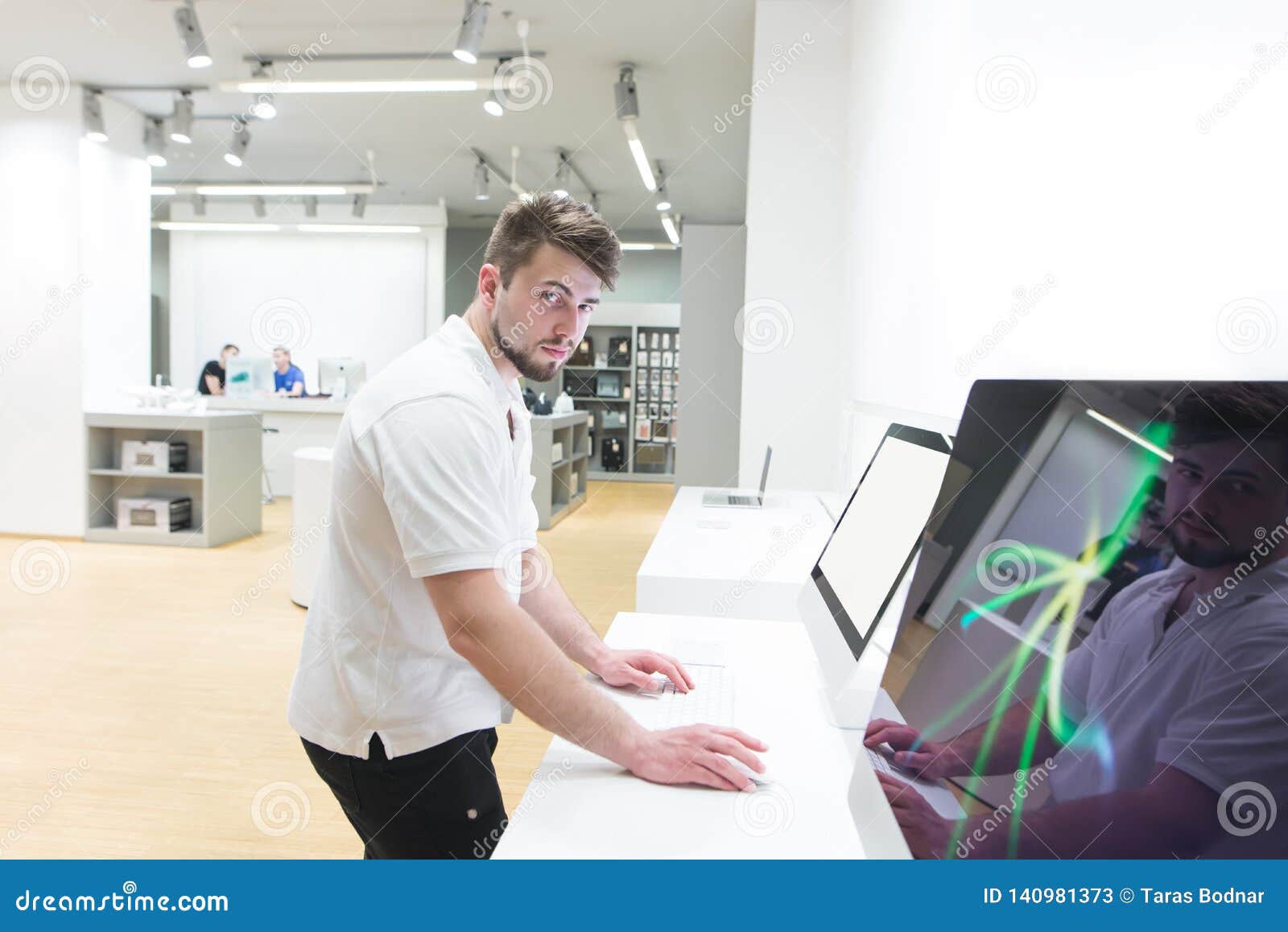 Portrait of a Man Standing in the Electronics Store in the Computer ...
