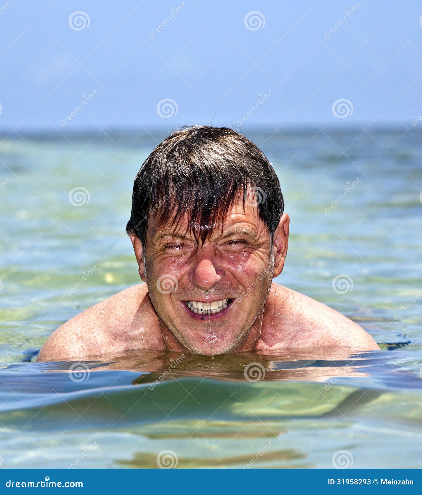 Portrait of a Man Swimming in the Ocean Stock Image - Image of clear ...
