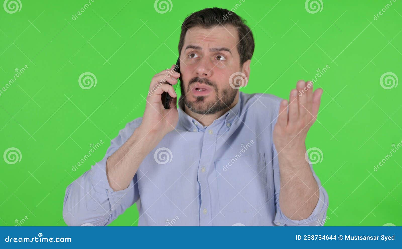 Portrait of Man Talking Angrily on Smartphone, Green Screen Stock Photo ...