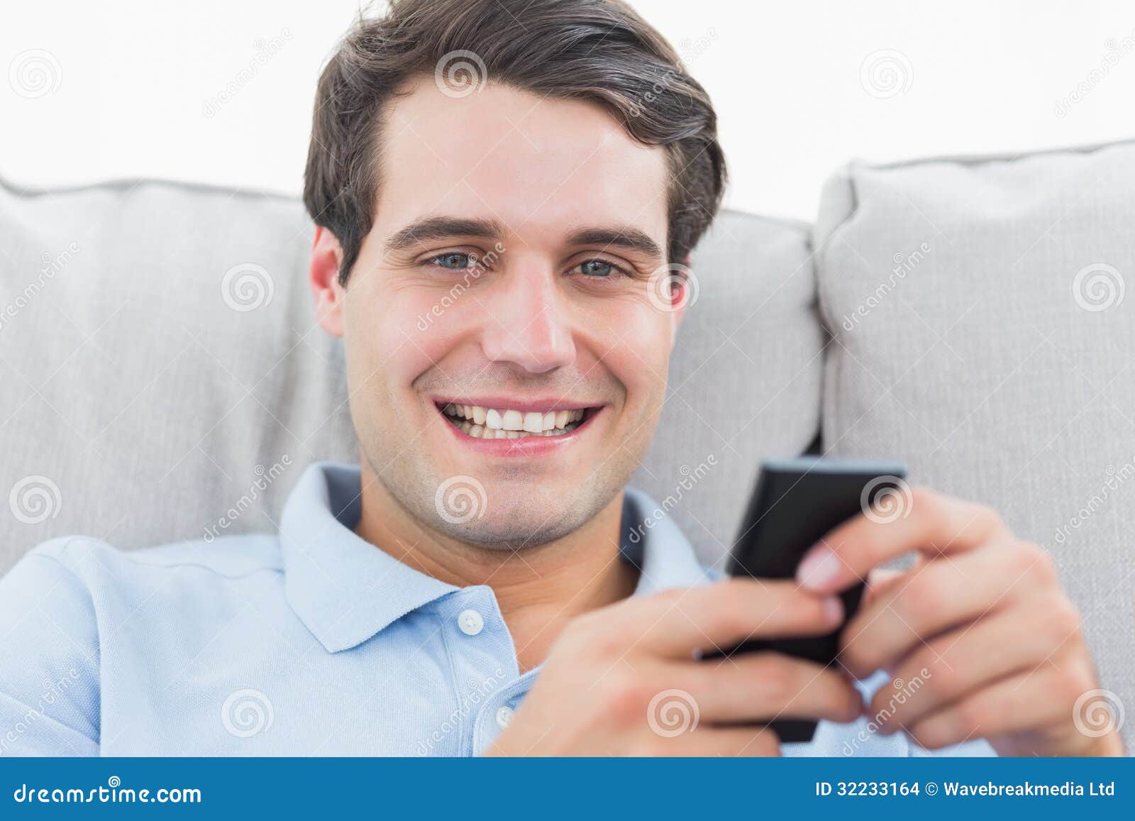 Portrait of a Man Text Messaging with His Phone Stock Photo - Image of ...