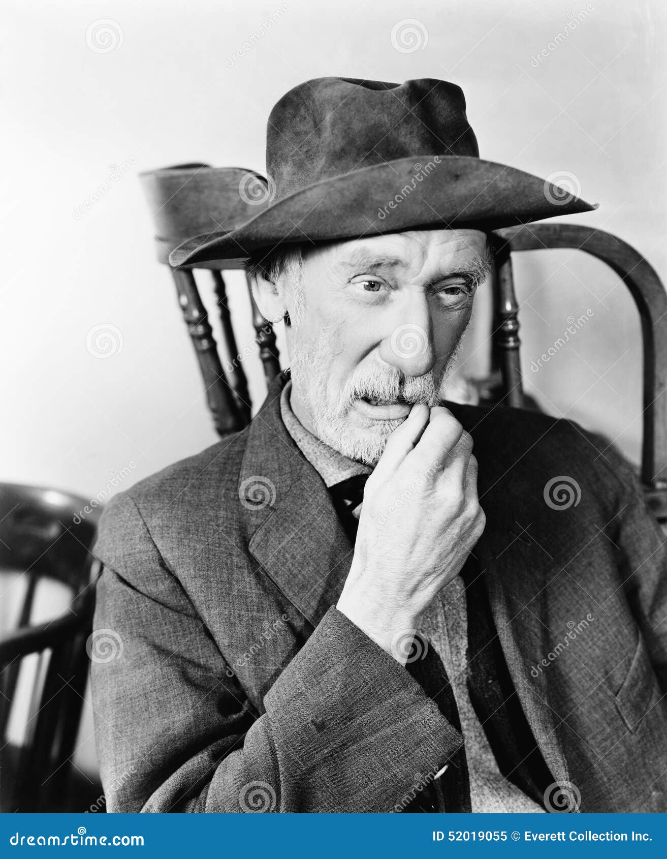 Portrait of a Man Thinking and Twirling His Mustache Stock Image ...