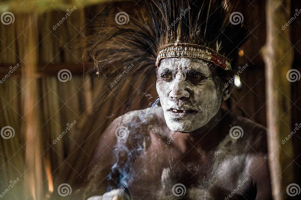 Portrait Of A Man From The Tribe Of Asmat People On Asmat Welcoming