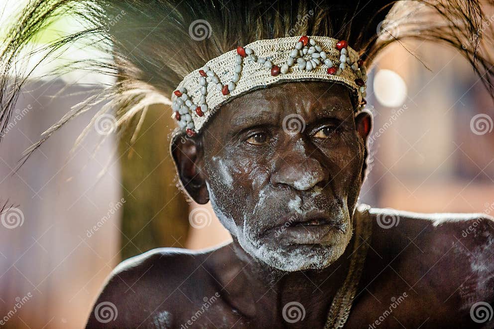 Portrait Of A Man From The Tribe Of Asmat People On Asmat Welcoming