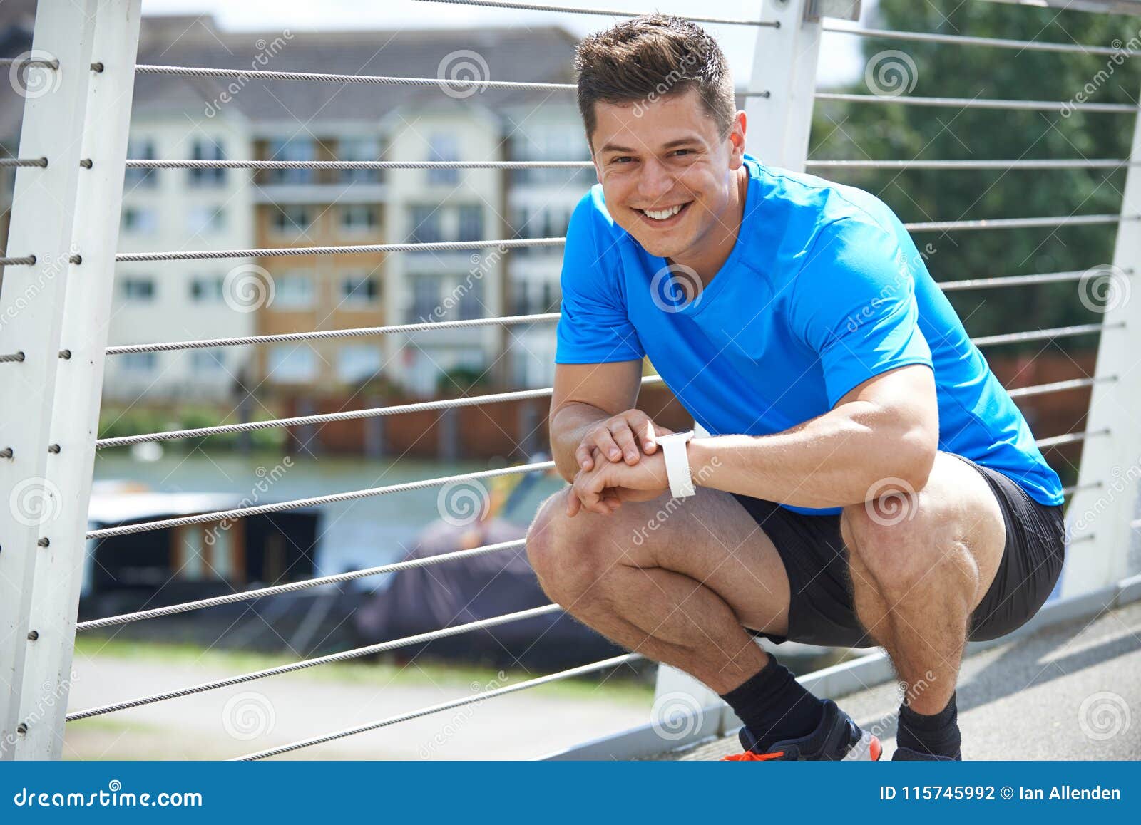 Portrait of Man Using Activity Tracker Whilst Exercising in Ci Stock ...