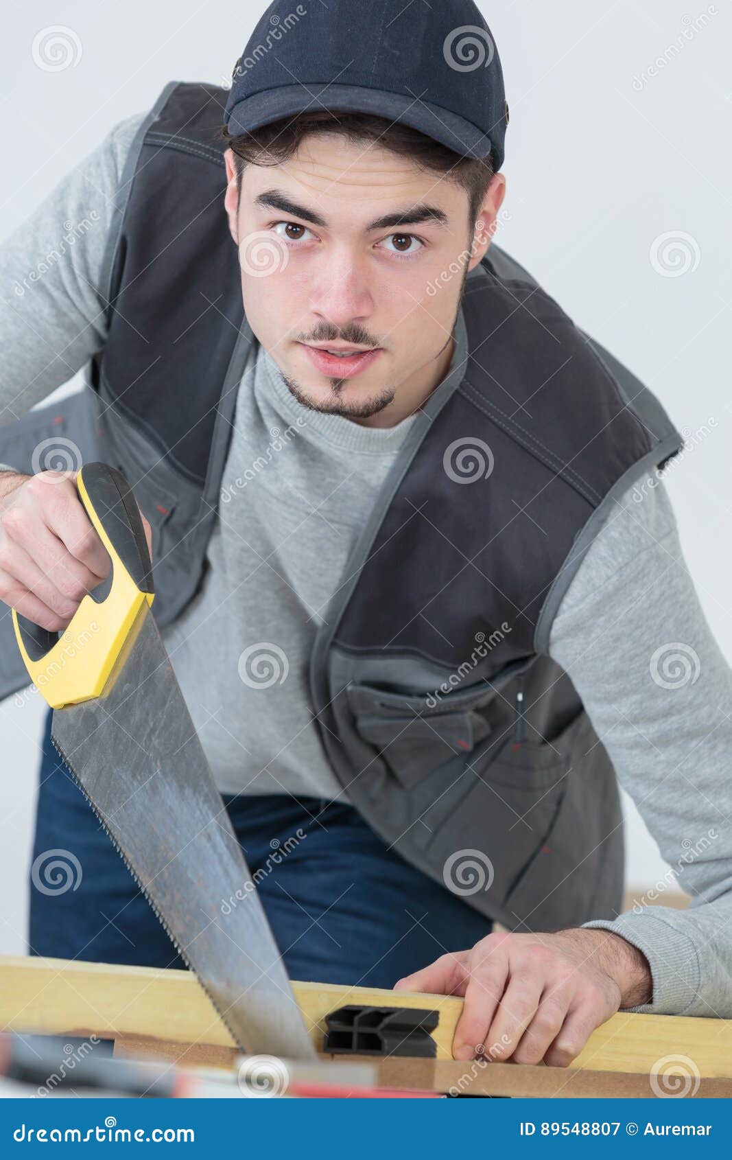 Portrait Man Using Hand Saw Stock Image - Image of industrial, labour ...