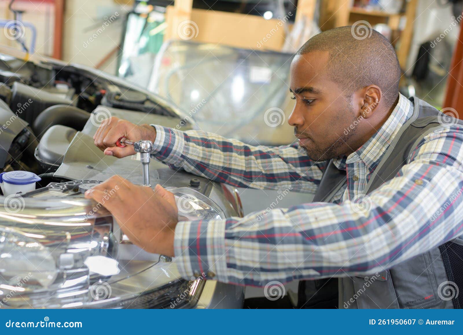 Portrait man using ratchet stock image. Image of diversity - 261950607