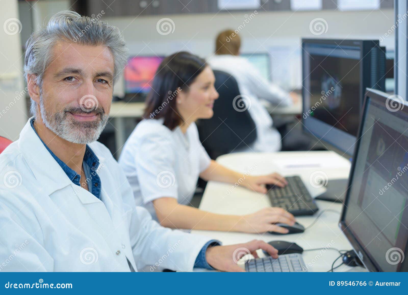 Portrait Man in White Coat Using Computer Stock Photo - Image of ...