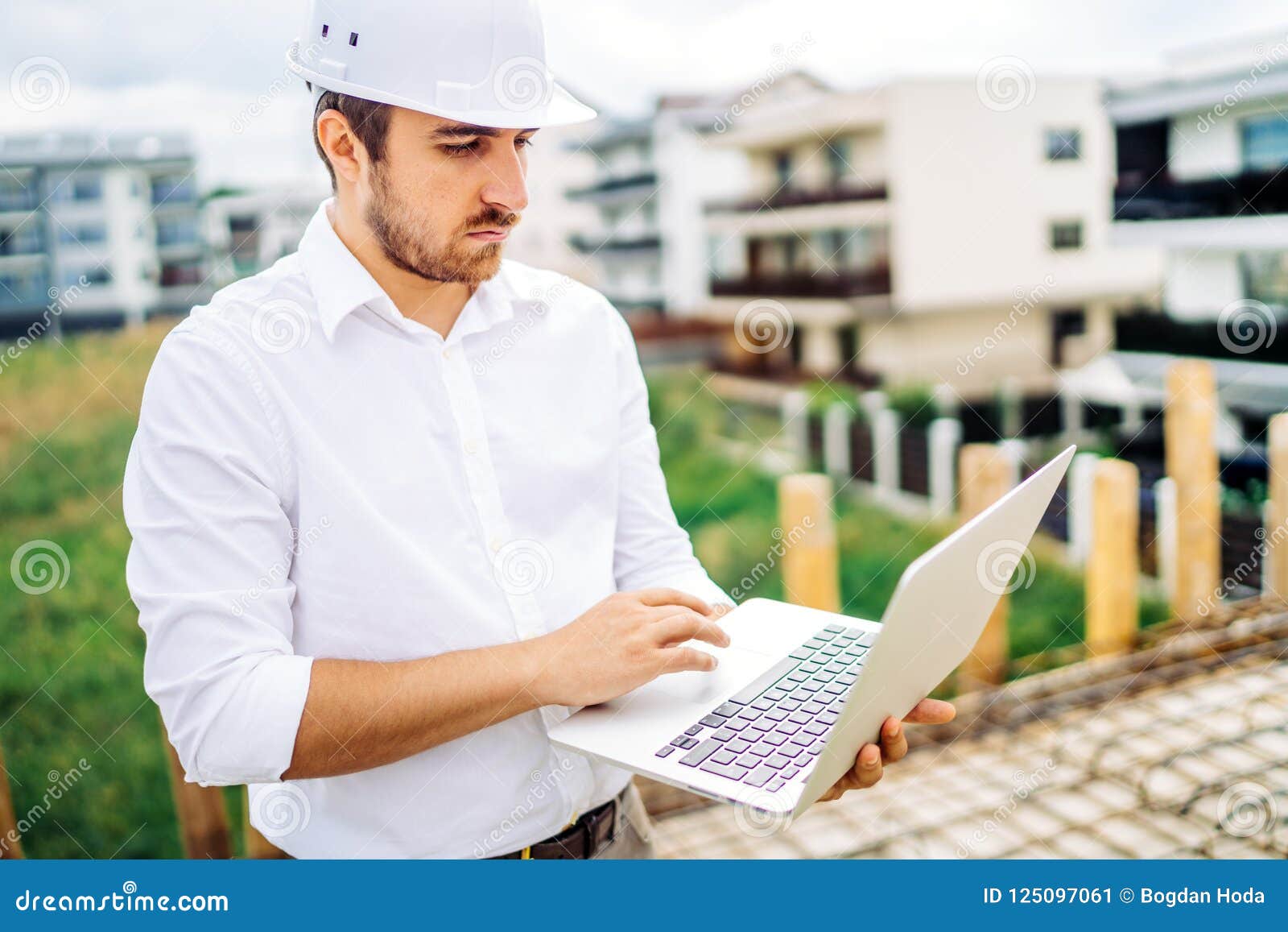 Portrait of Man Working on Construction Site. Engineer, Worker and ... Portrait of Man Working on Construction Site. Engineer, Worker and ...