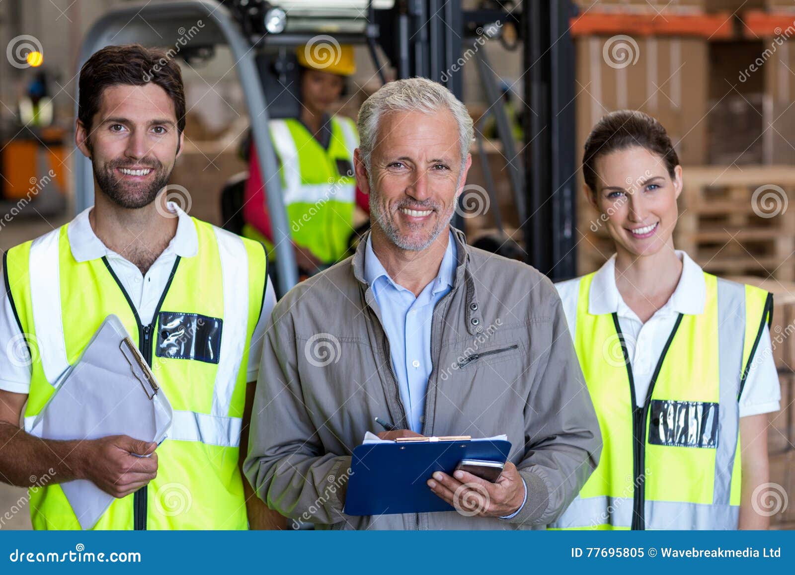 Portrait of Manager is Posing Next To the Workers and Smiling Stock ...