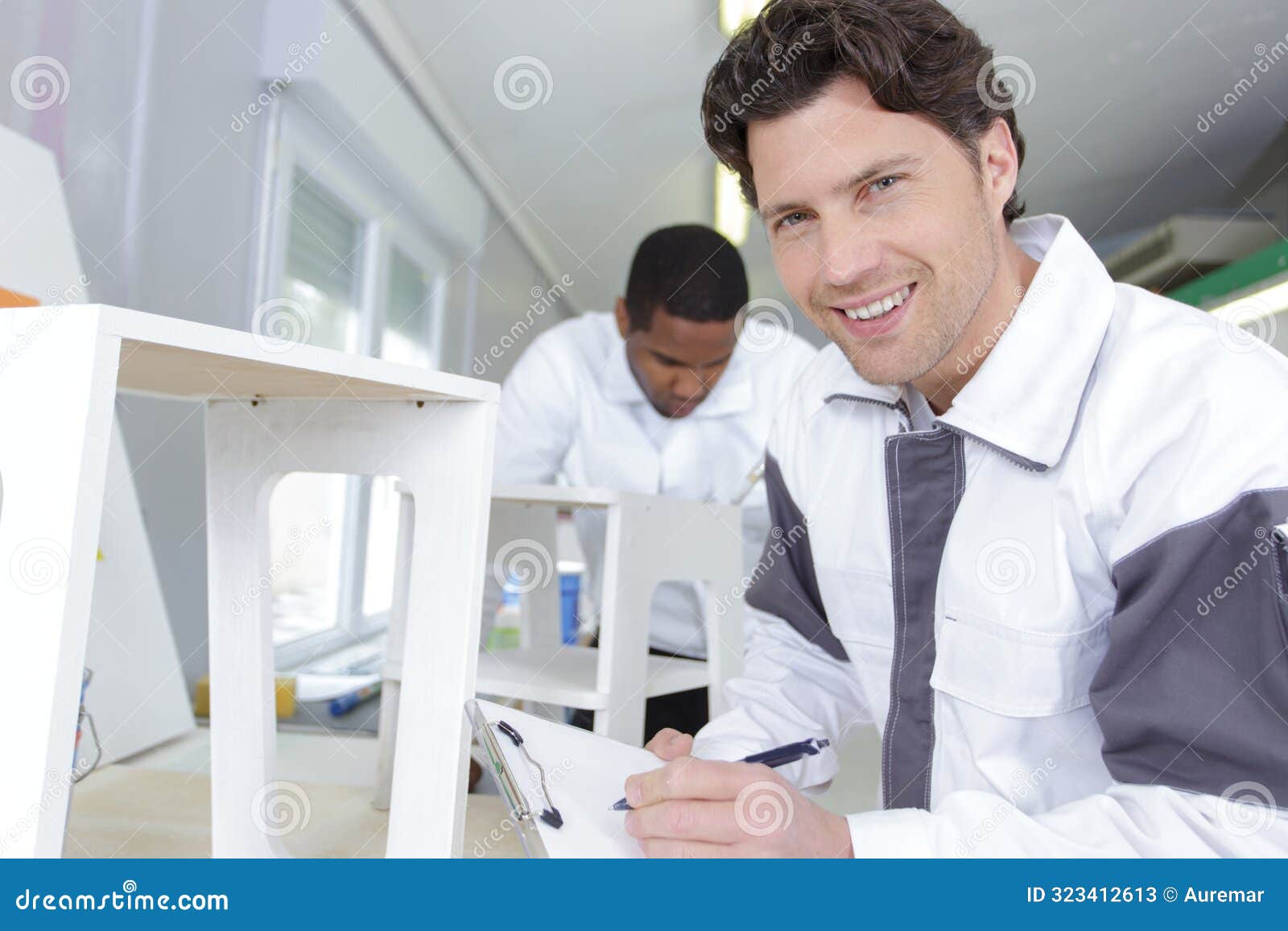Portrait Mature Carpenter with Young Apprentice in Workshop Stock Image ...