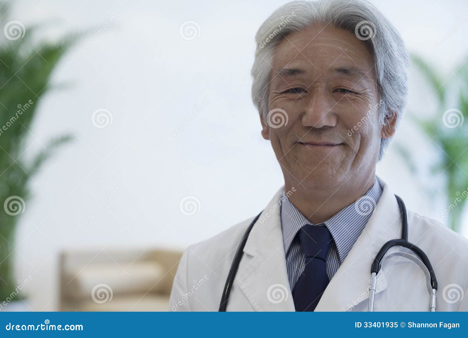 Portrait of Mature Doctor Looking at Camera and Smiling Stock Image ...