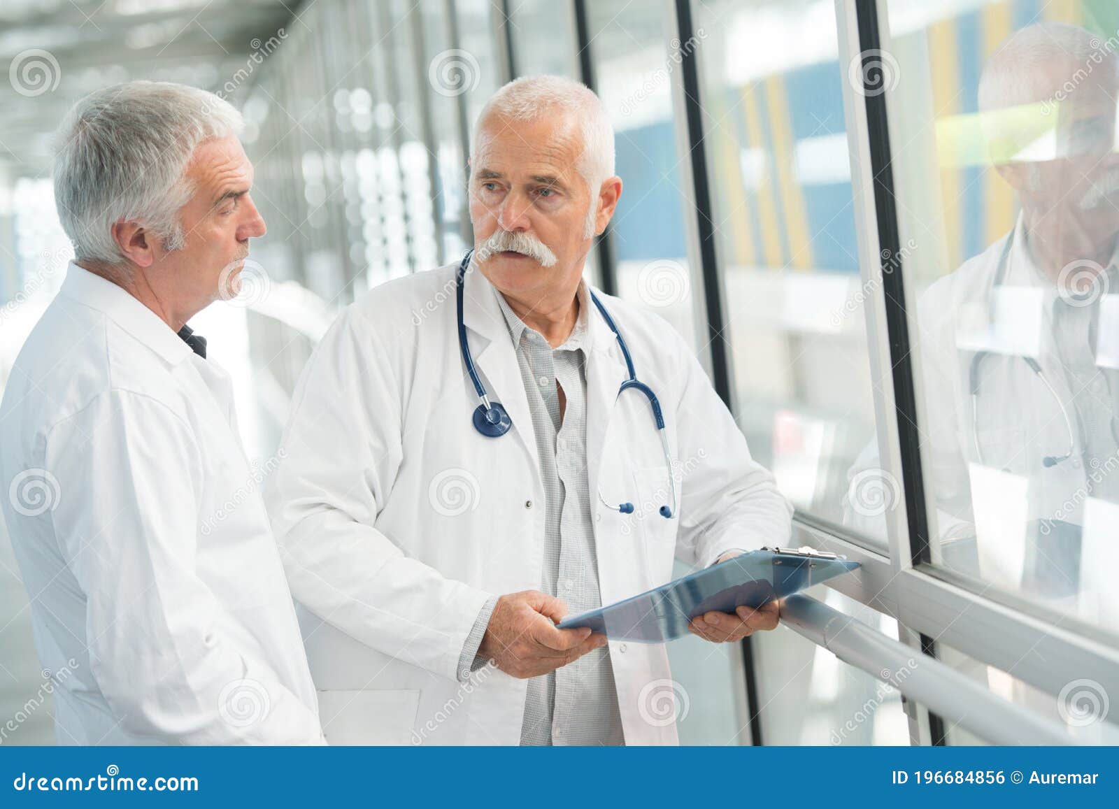 Portrait Mature Doctors Talking Stock Photo - Image of portrait ...