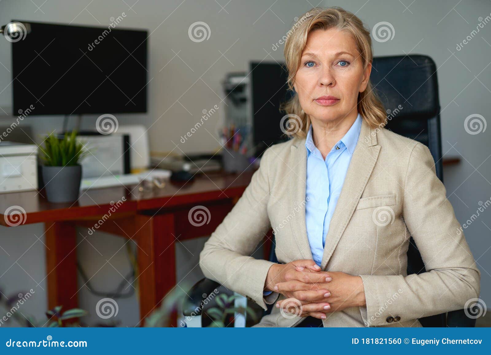 Portrait of Mature Female Boss Working in Office. Stock Photo - Image ...
